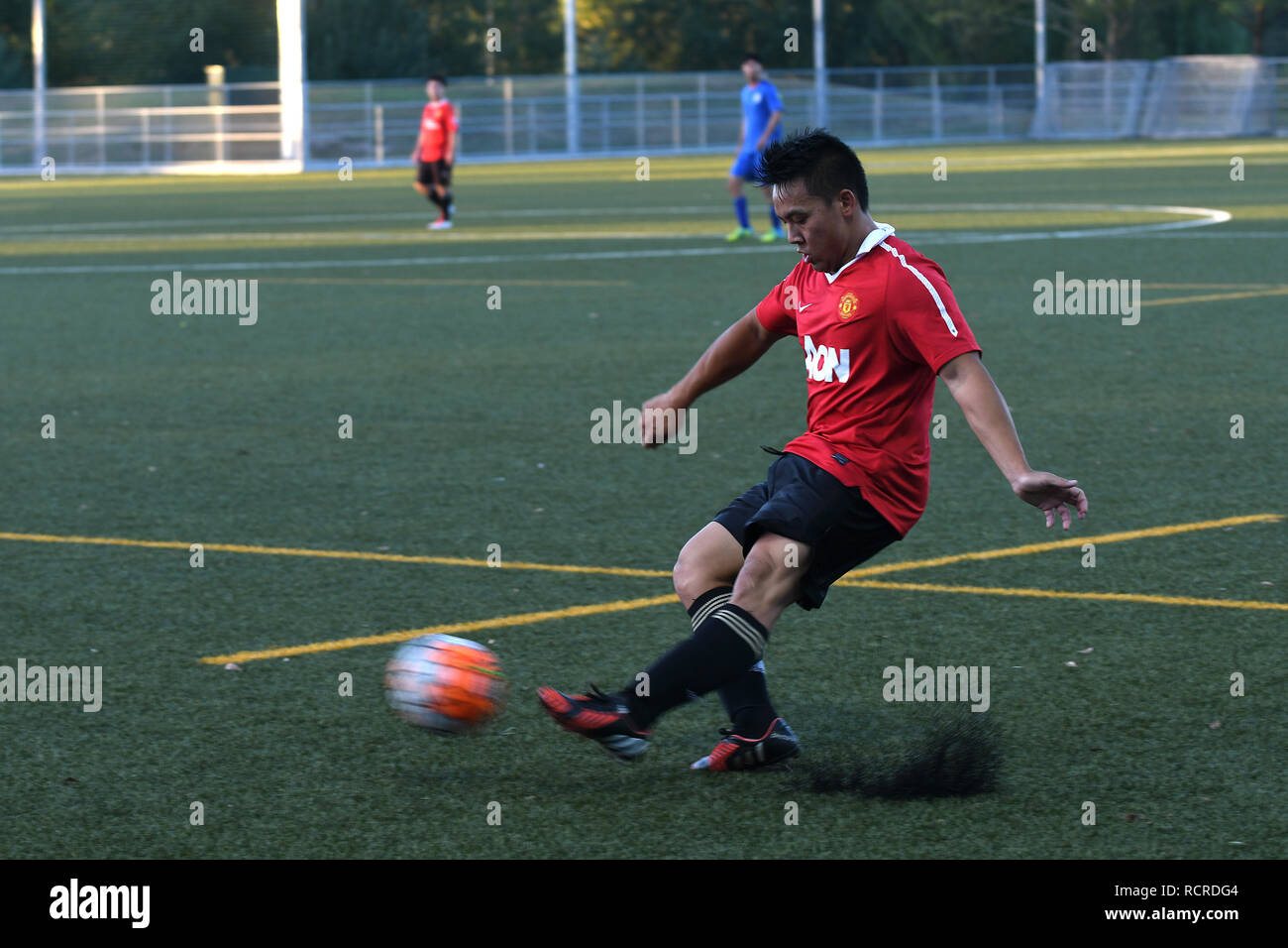 2 Chinese Teams having a friendly match in the evening Stock Photo - Alamy