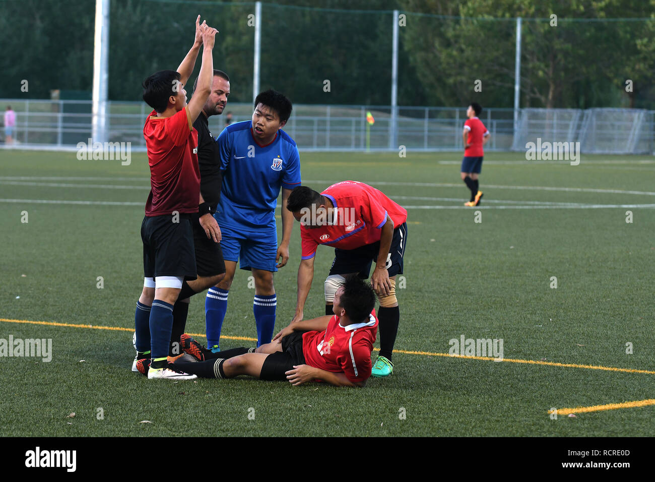 2 Chinese Teams having a friendly match in the evening Stock Photo - Alamy