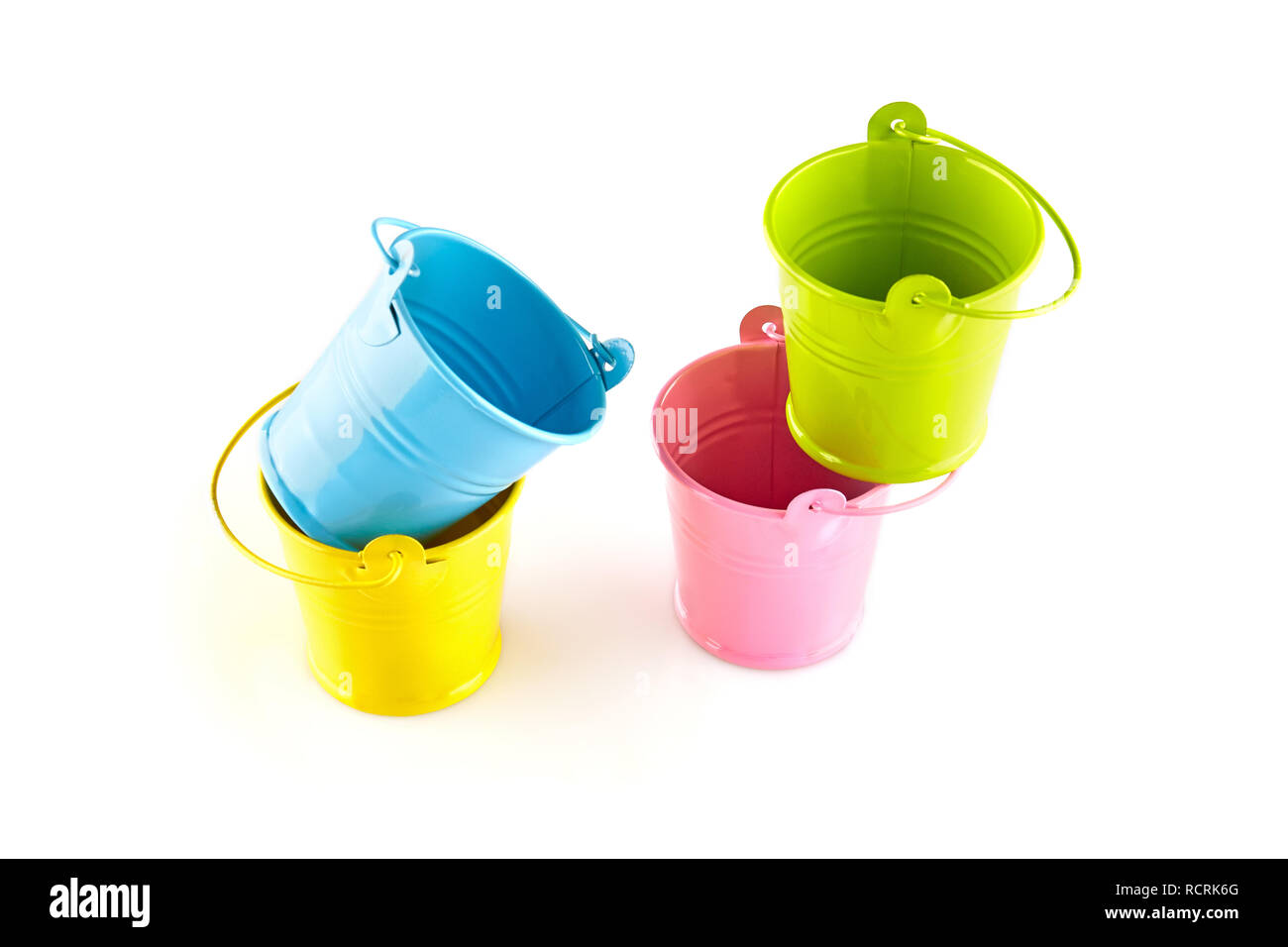 Four small colorful buckets. Isolated on white background Stock Photo ...