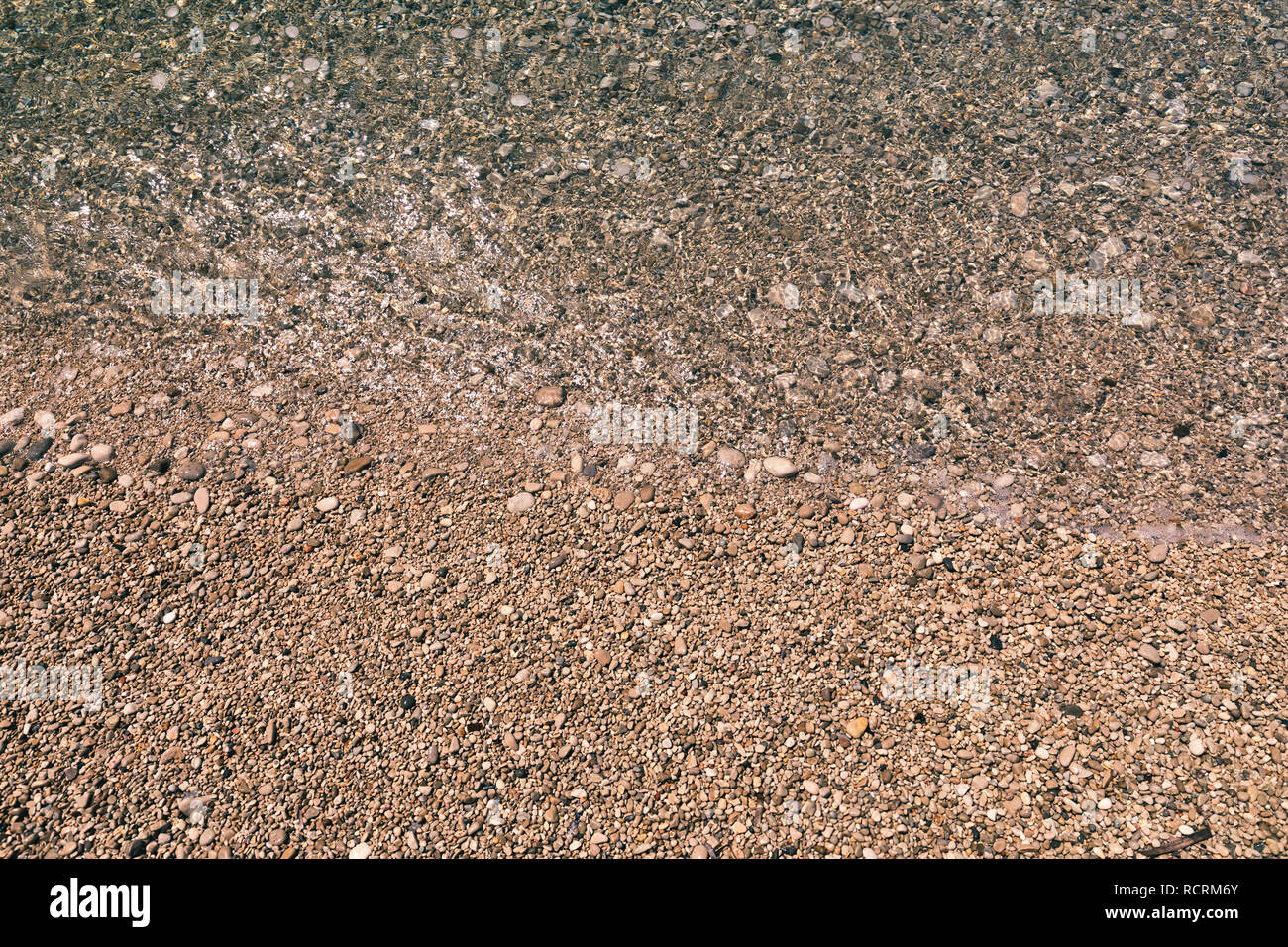 Stones under water. Sea pebbles on the beach. Sea pebbles on the beach ...