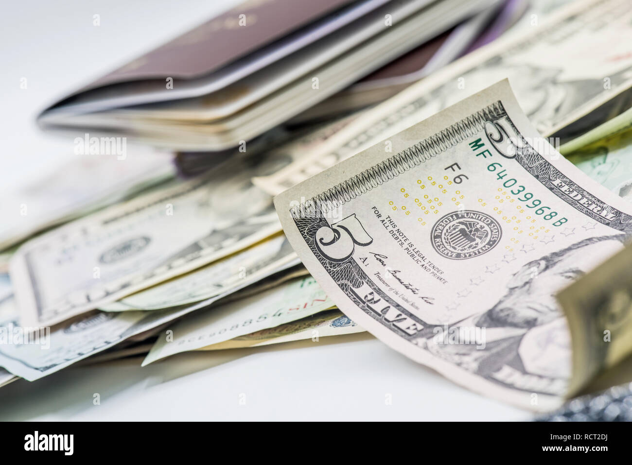 Money and passport for travel. US Dollar currency, Banknotes of America ...