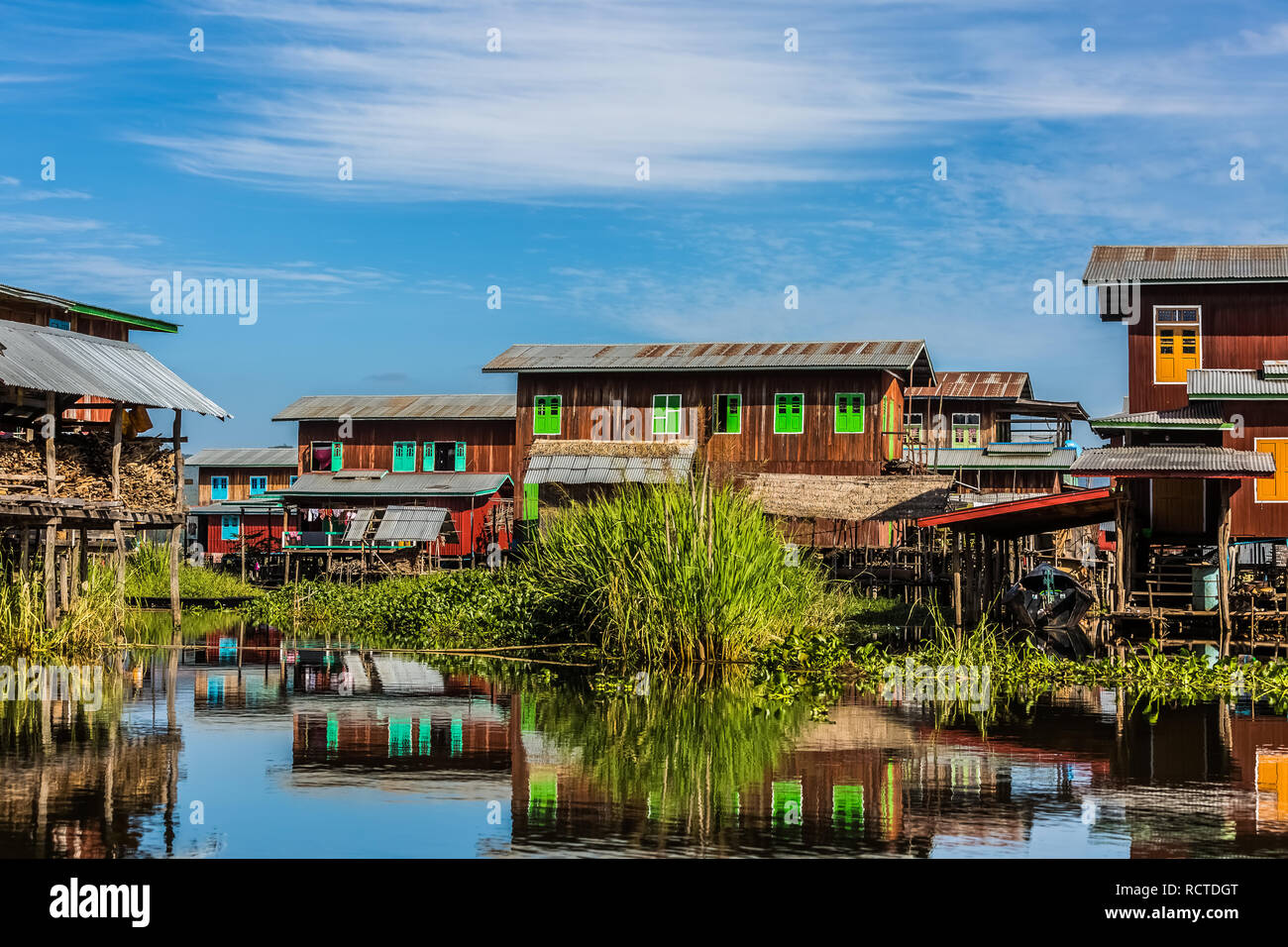 floating houses on the canal of the Inle Lake Shan state in Myanmar ...