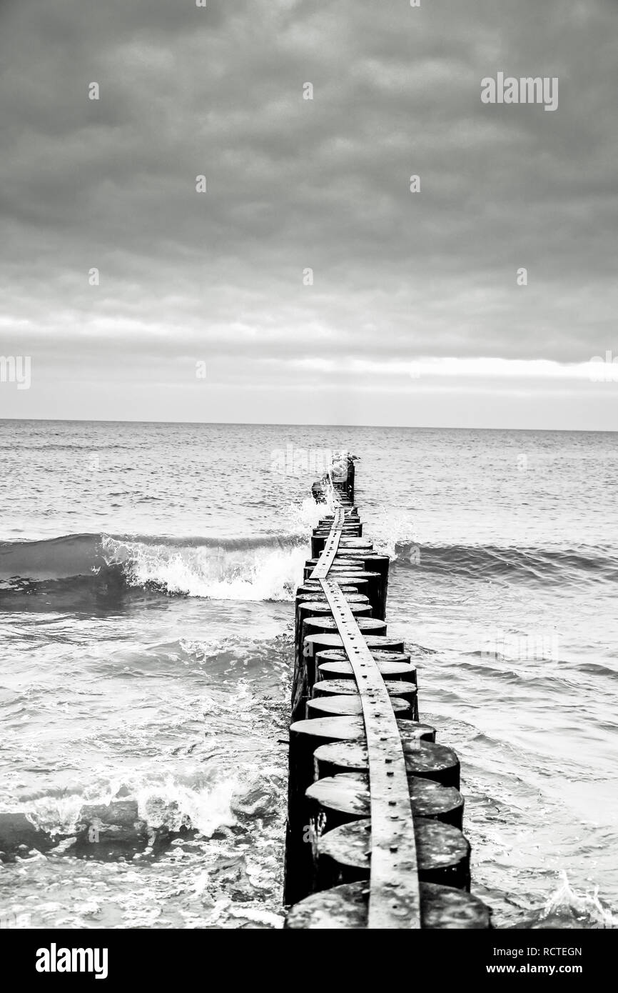 Wooden wavebreaker hi-res stock photography and images - Alamy