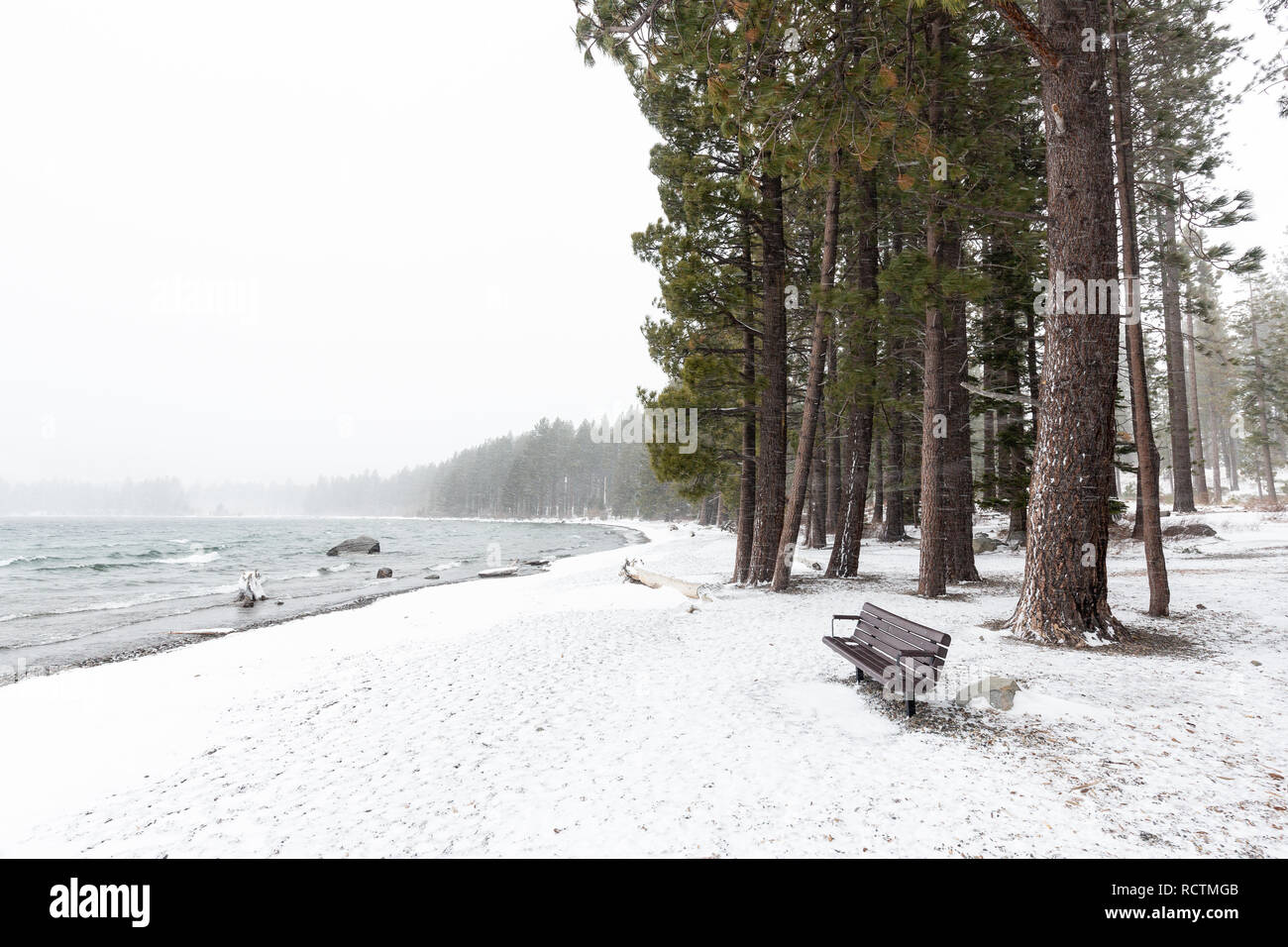 A view of Fallen Leaf Lake covered in snow during a winter storm Stock ...