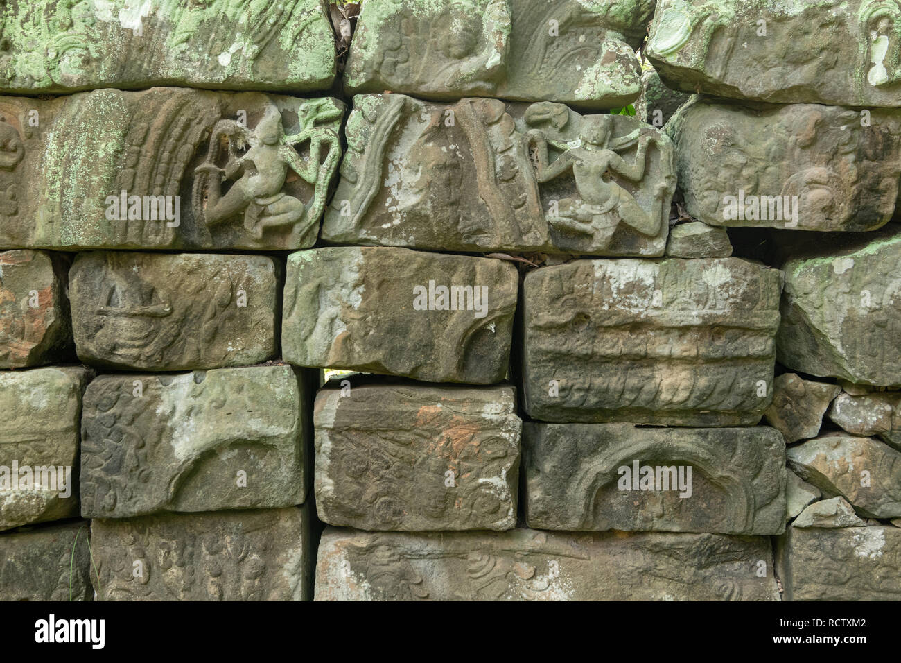 Jumble of decorated stone blocks from temple Stock Photo - Alamy