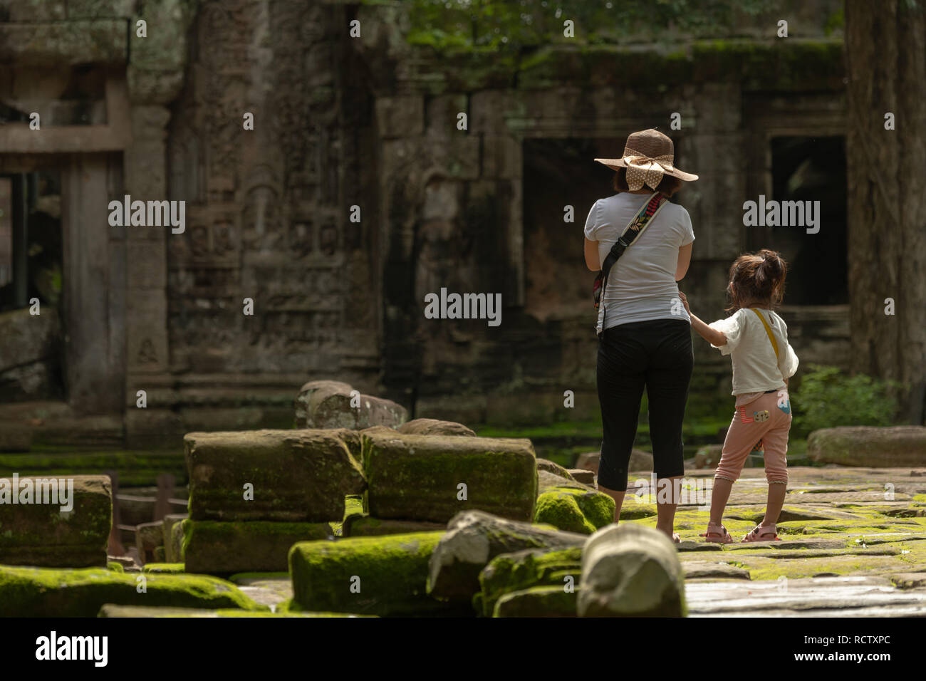 Mother daughter stand in temple hi-res stock photography and images - Alamy