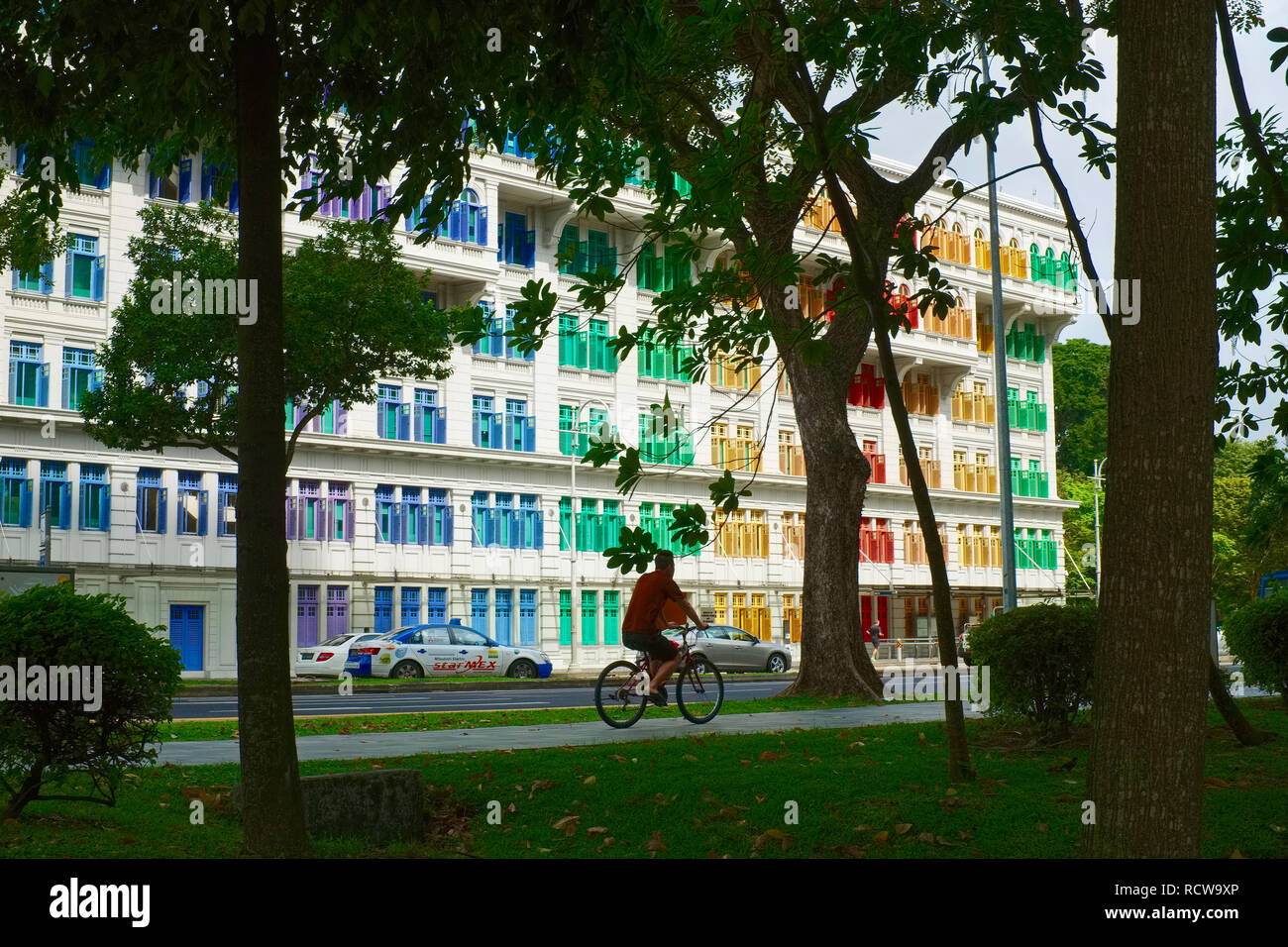 A man cycles past the Ministry for Culture, Community and Youth (MCCY ...