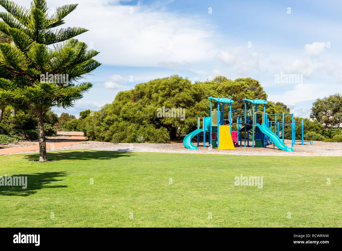 Empty playground in suburban park on beautiful spring day in Dalyellup ...