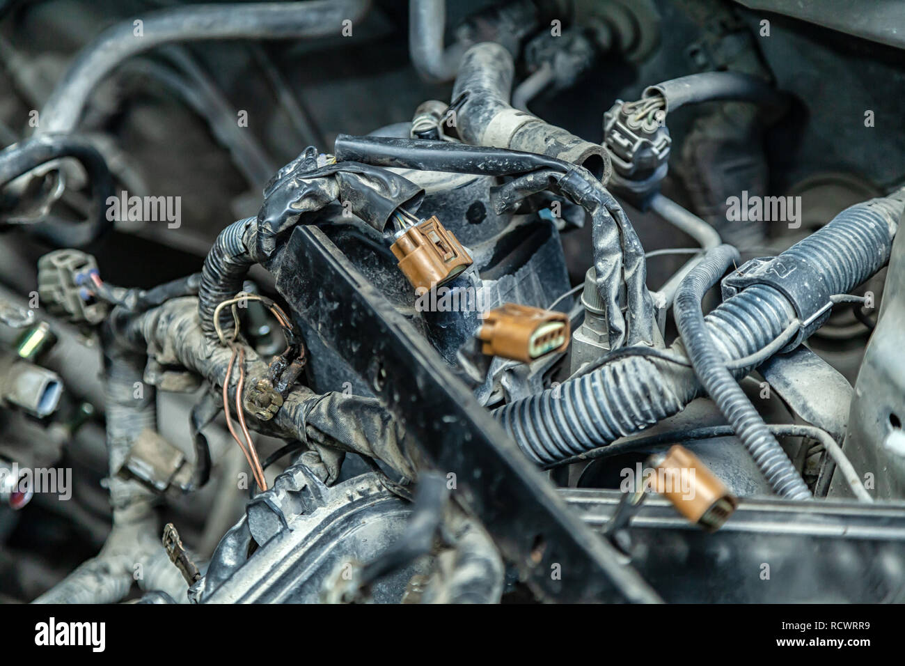 Close-up of the wiring of the engine of a supported car Stock Photo - Alamy