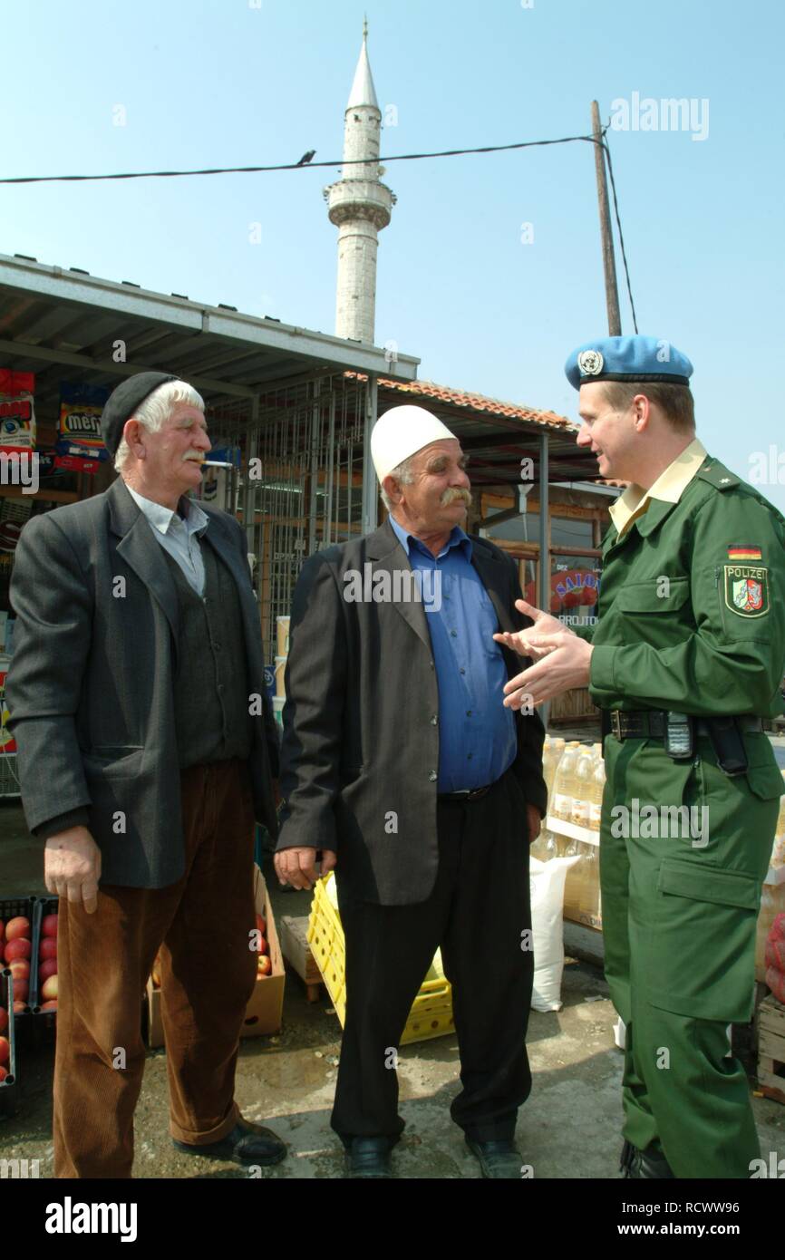 German police patrol in the old town of Gjakova, the police operations ...