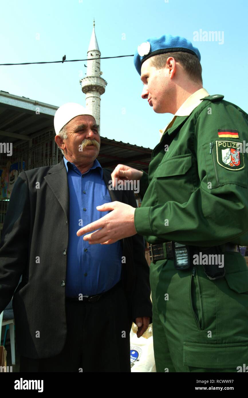 German police patrol in the old town of Gjakova, the police operations ...