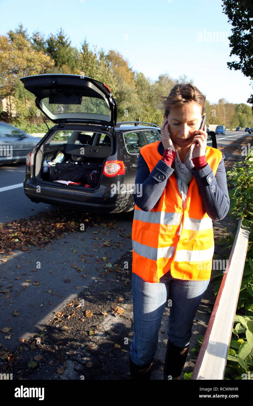 Car break down person phoning for help hi-res stock photography and ...