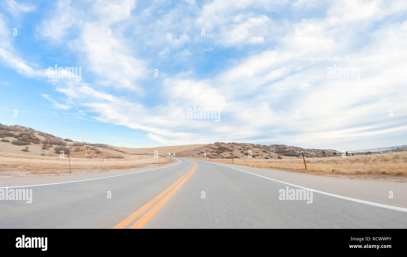 Driving on paved road in rural area Stock Photo - Alamy