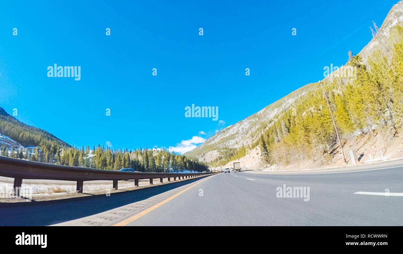 Drivign West on interstate highway I70 through the mountains Stock ...