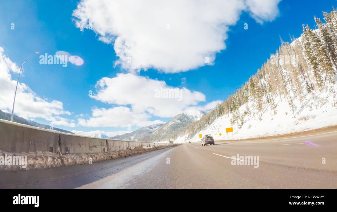 Drivign West on interstate highway I70 through the mountains Stock ...