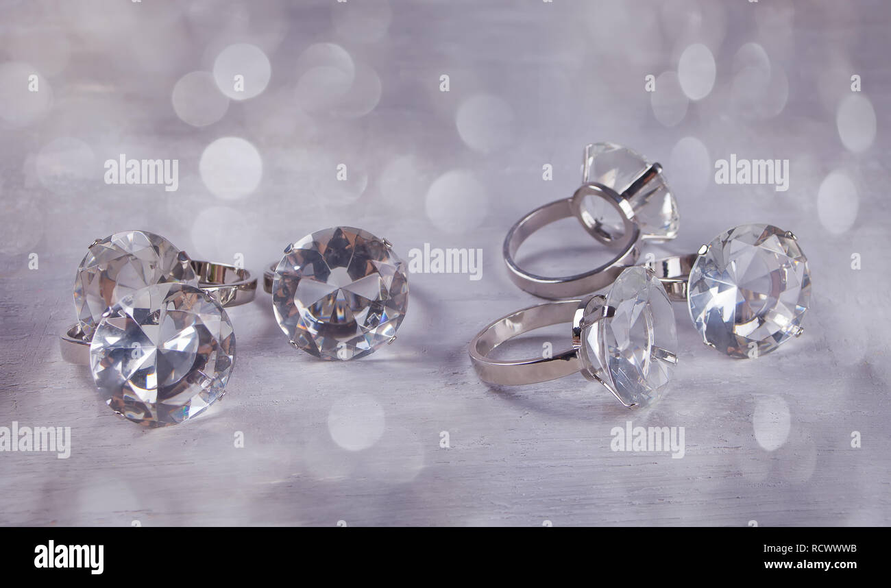 Silver giant wedding rings on a grey background with boke Stock Photo ...
