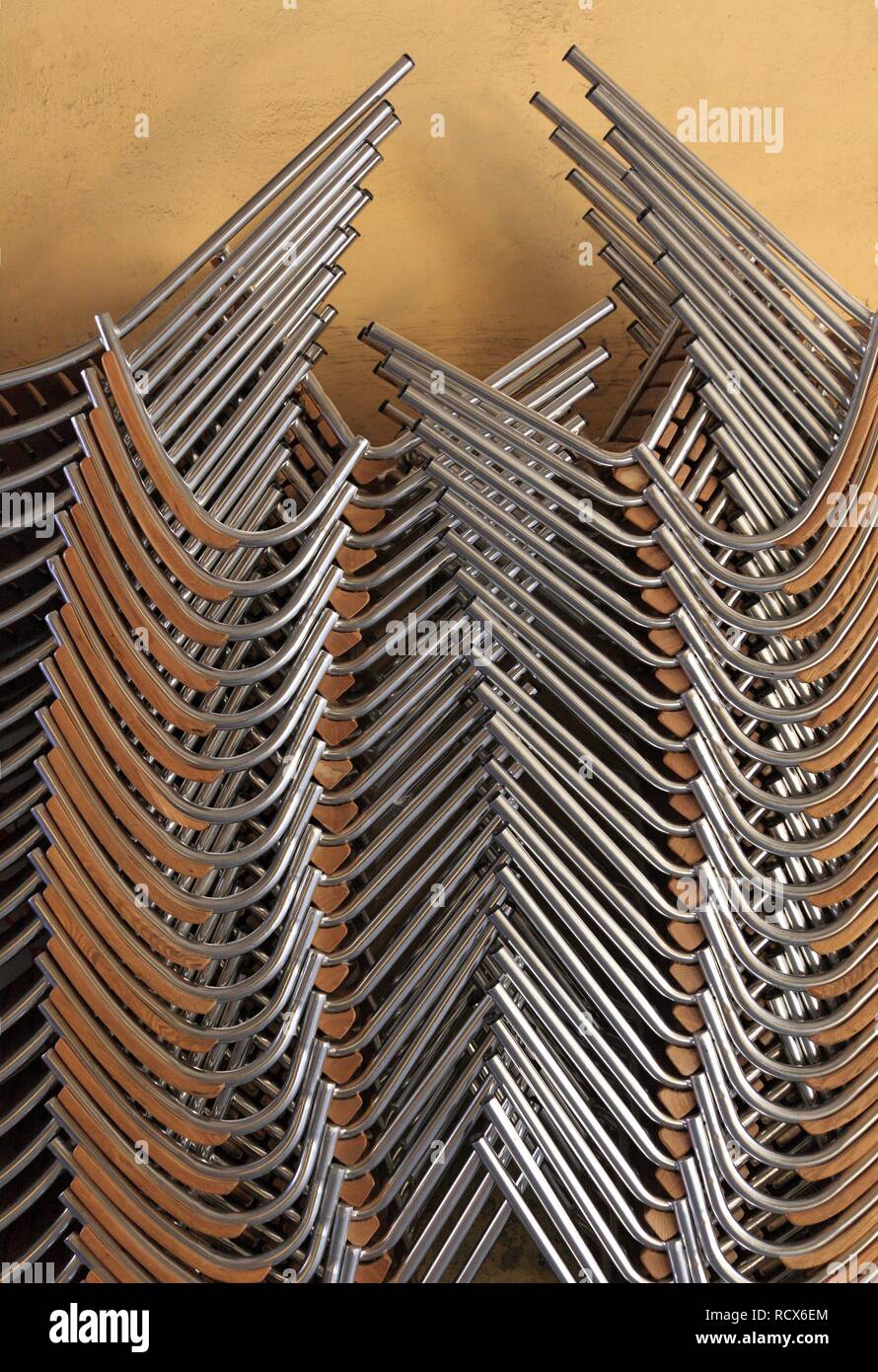Pile of chairs stacked hi-res stock photography and images - Alamy