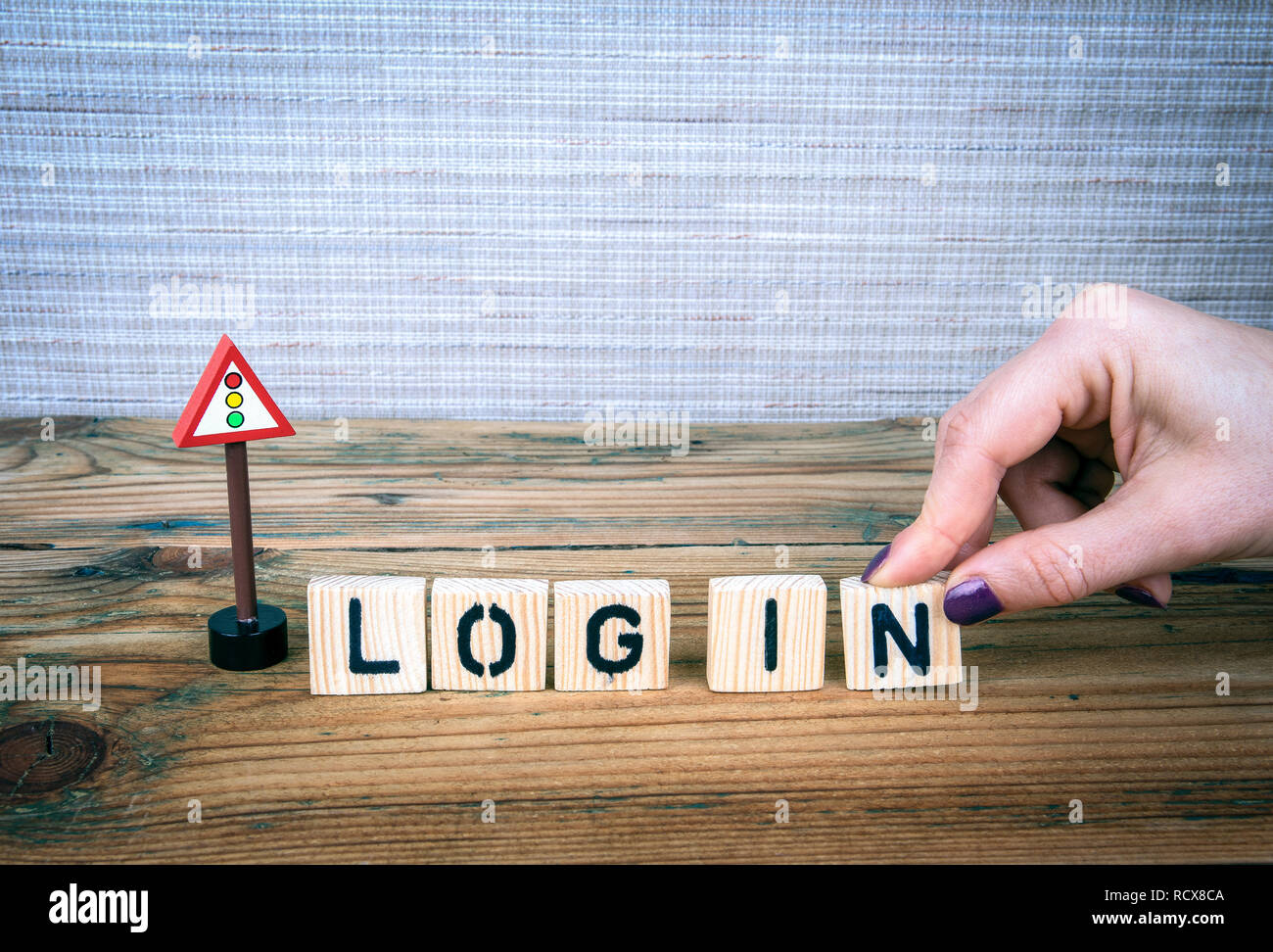 Log in concept. Wooden letters on the office desk Stock Photo - Alamy