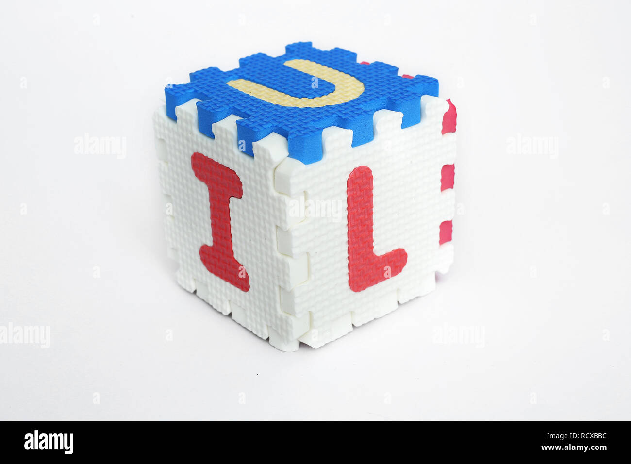 Portrait of blocks forming cube with letter. Isolated on the white ...