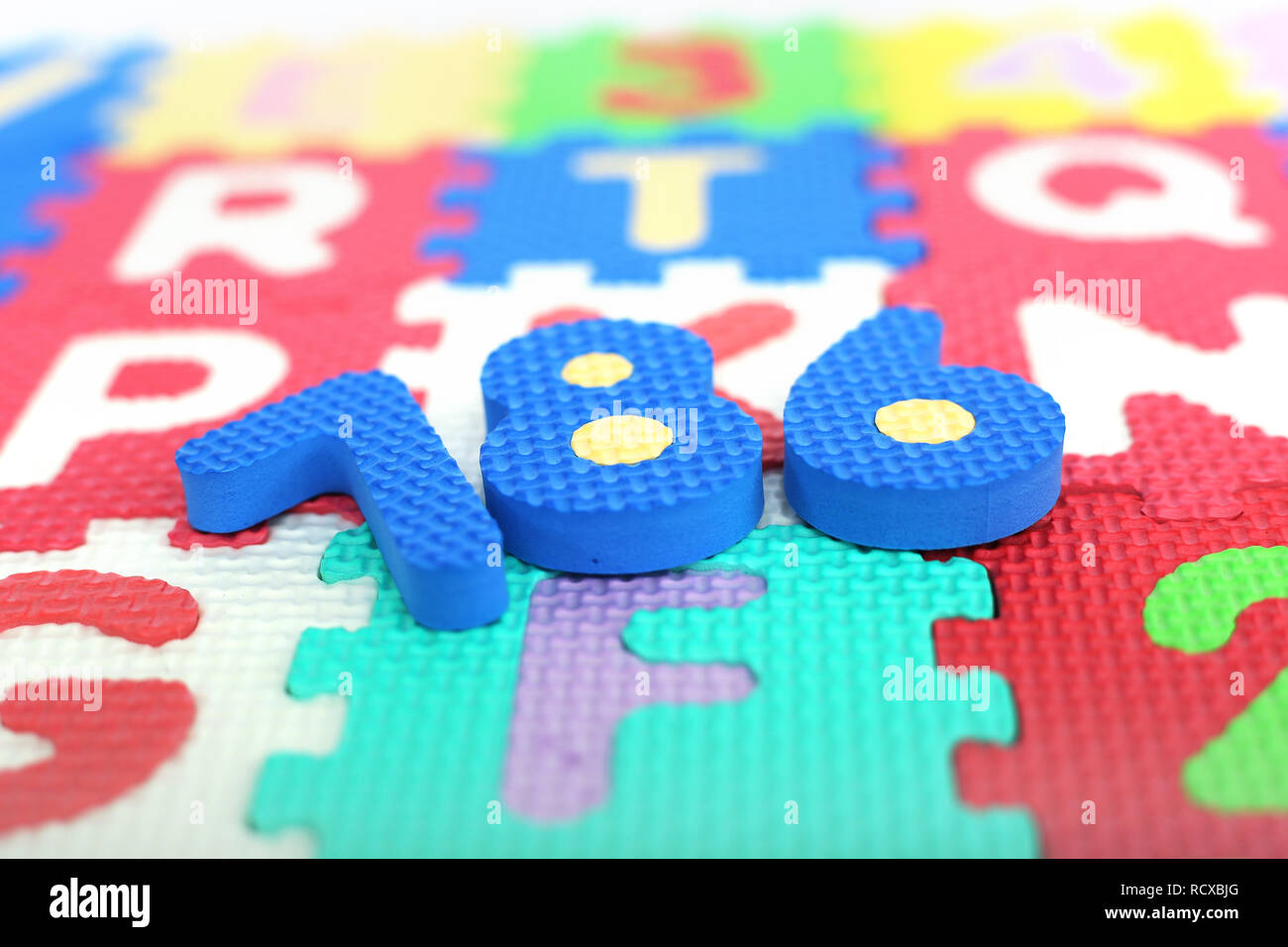 Picture of numbers on the colored alphabets letters Stock Photo - Alamy