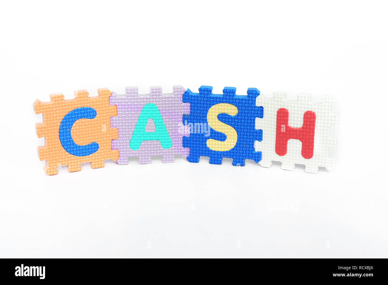 Alphabets blocks forming the word cash. Isolated on the white ...