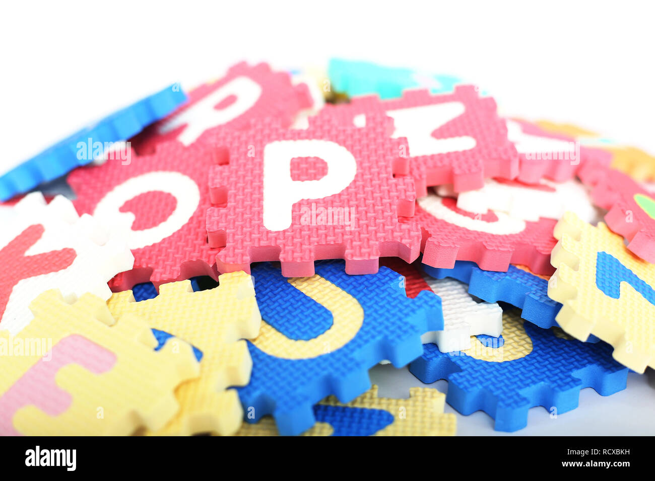 Pile of colorful alphabets blocks. Isolated on the white background ...