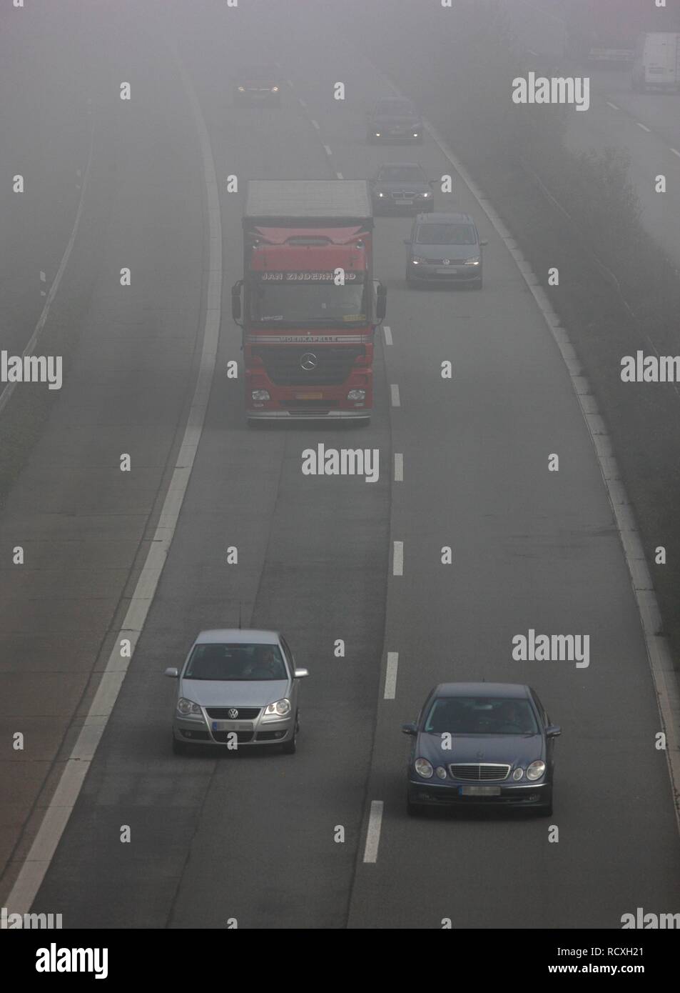 Autobahn A52, motorway, in thick fog, autumn, visibility under 100 ...