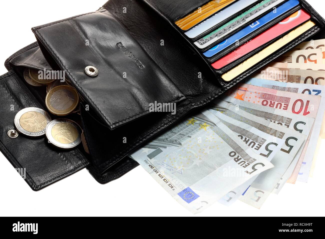 Wallet with various credit cards, bank cards, euro banknotes, euro ...