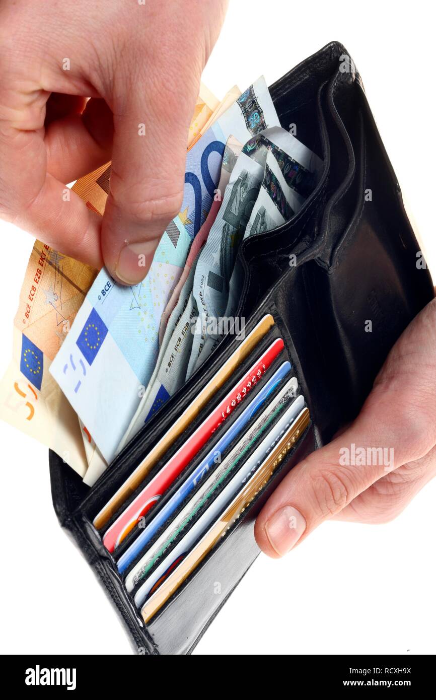 Hands holding wallet bank cards hi-res stock photography and images - Alamy