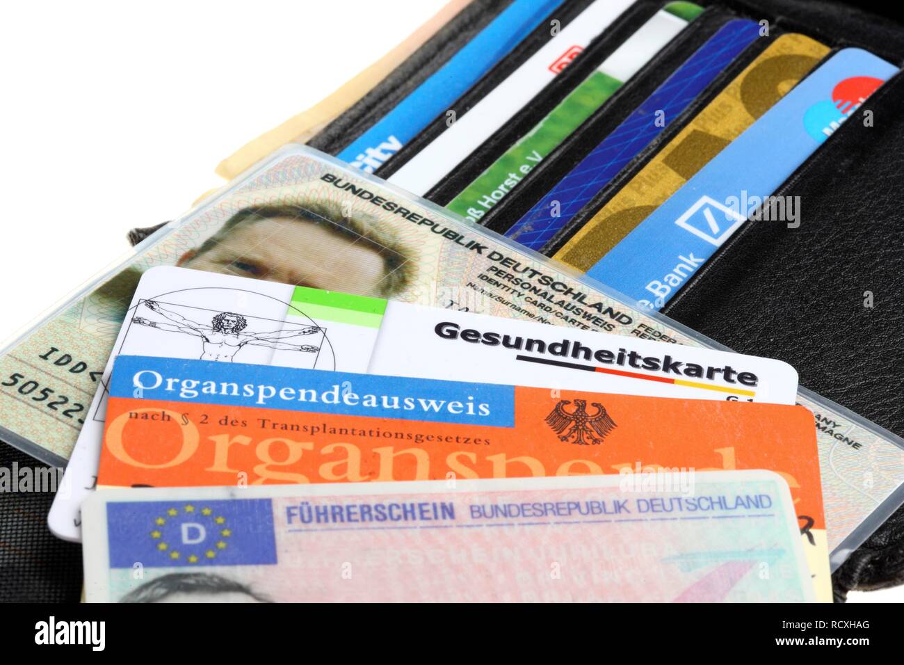 Wallet with various ID documents, identity card, driving license ...