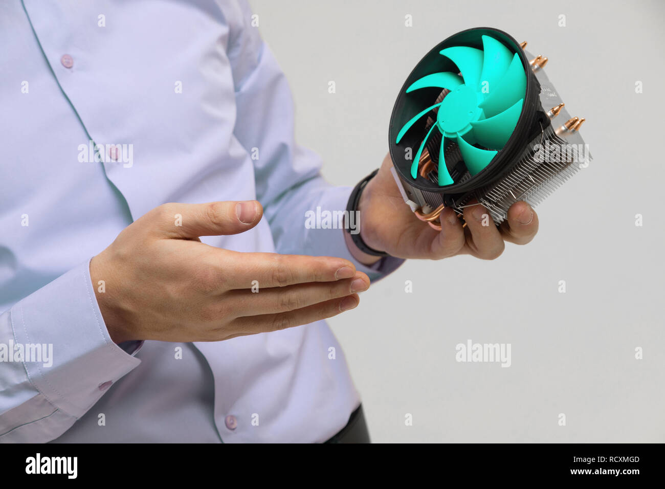 Cooler in men's hands close-up isolated on light background Stock Photo ...