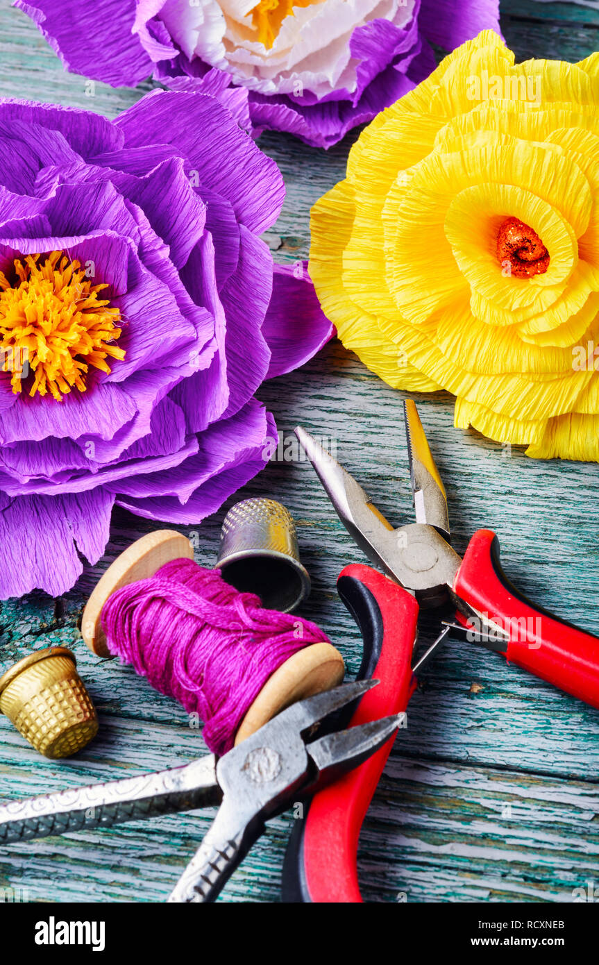 Colourful handmade paper flowers.Paper craft and tools Stock Photo - Alamy