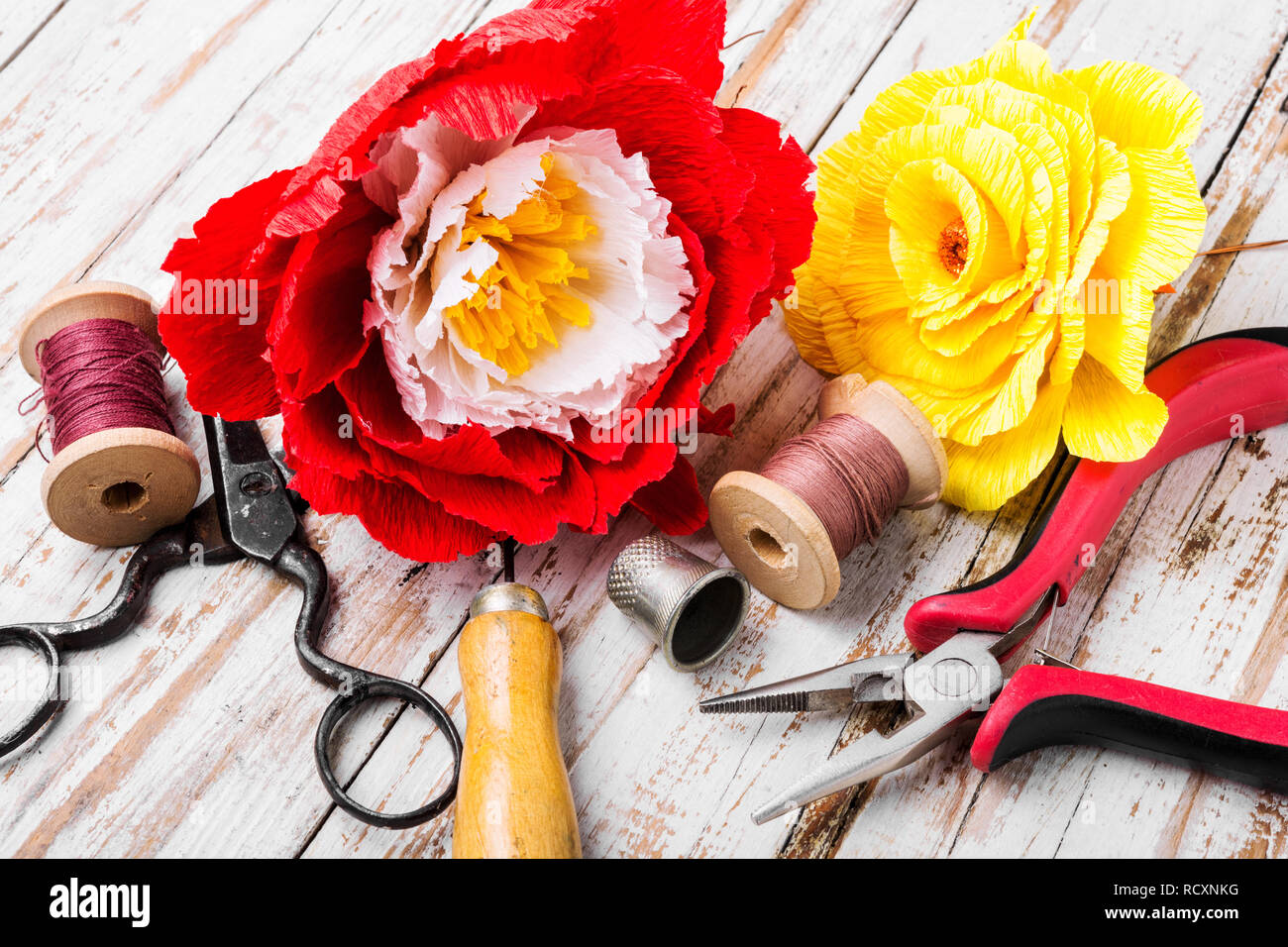 Colourful handmade paper flowers.Paper craft and tools Stock Photo - Alamy