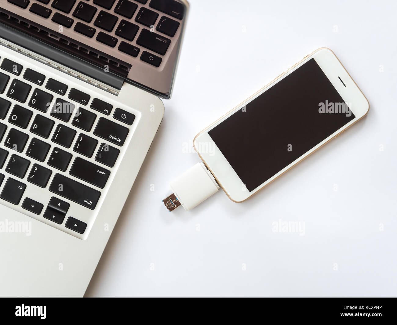 Top view (Flat lay) image of smartphone connected with two way external ...