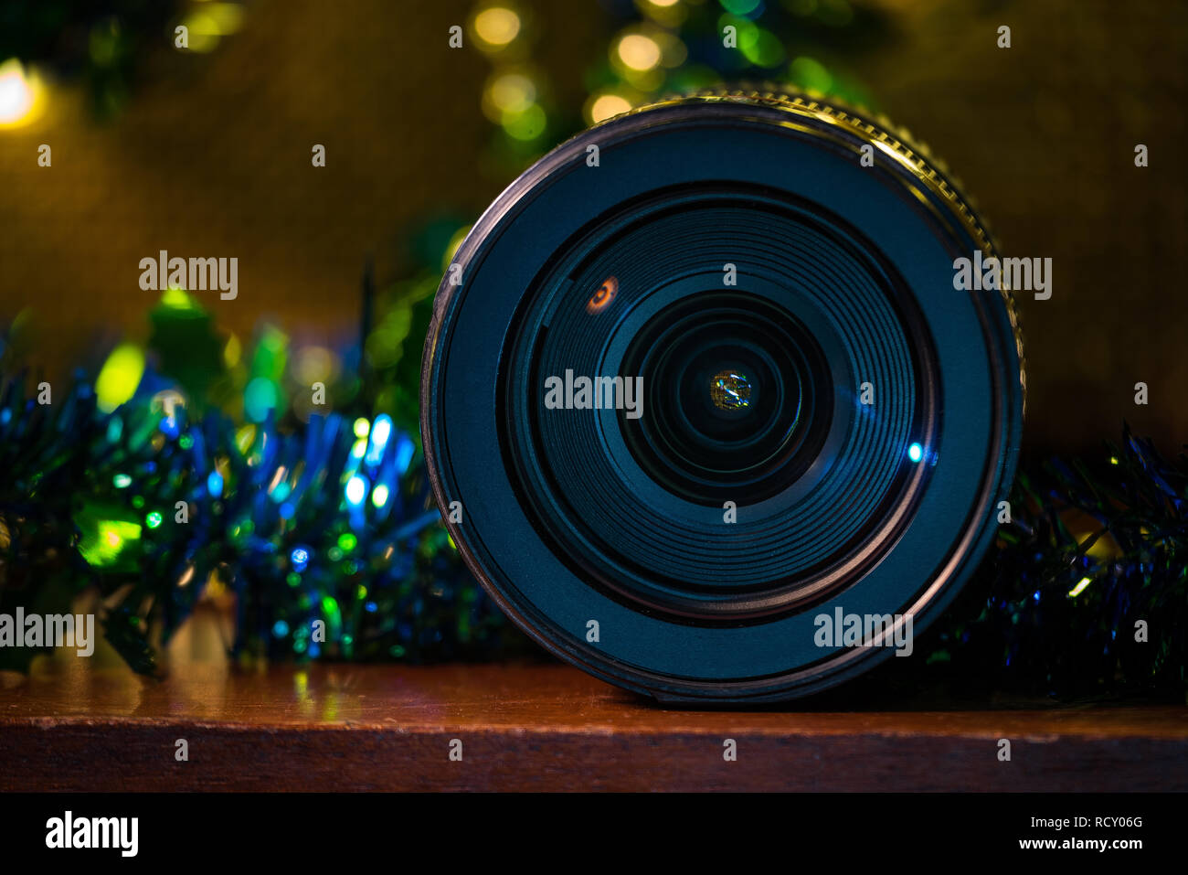 Close up of camera lens front element with defocused bokeh balls in the ...
