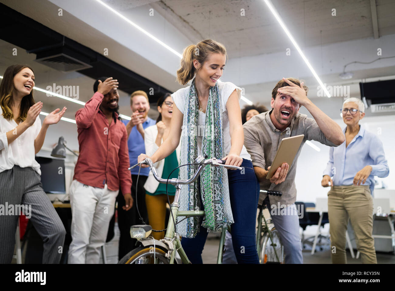 Happy business people are having fun in a modern office. Happy team ...