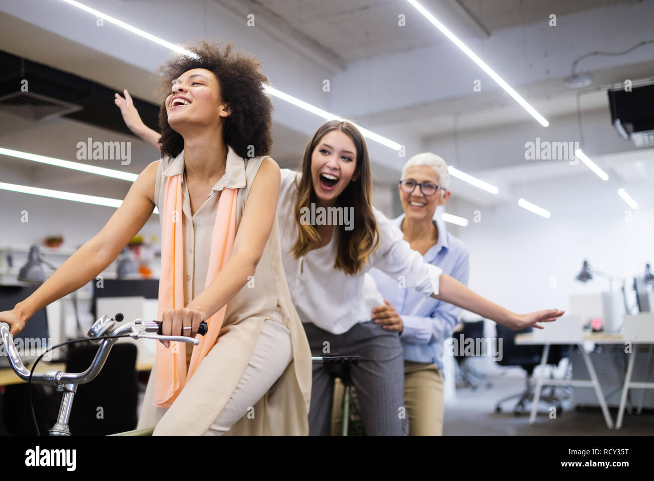 Group of multiethnic business people having corporate fun in office ...