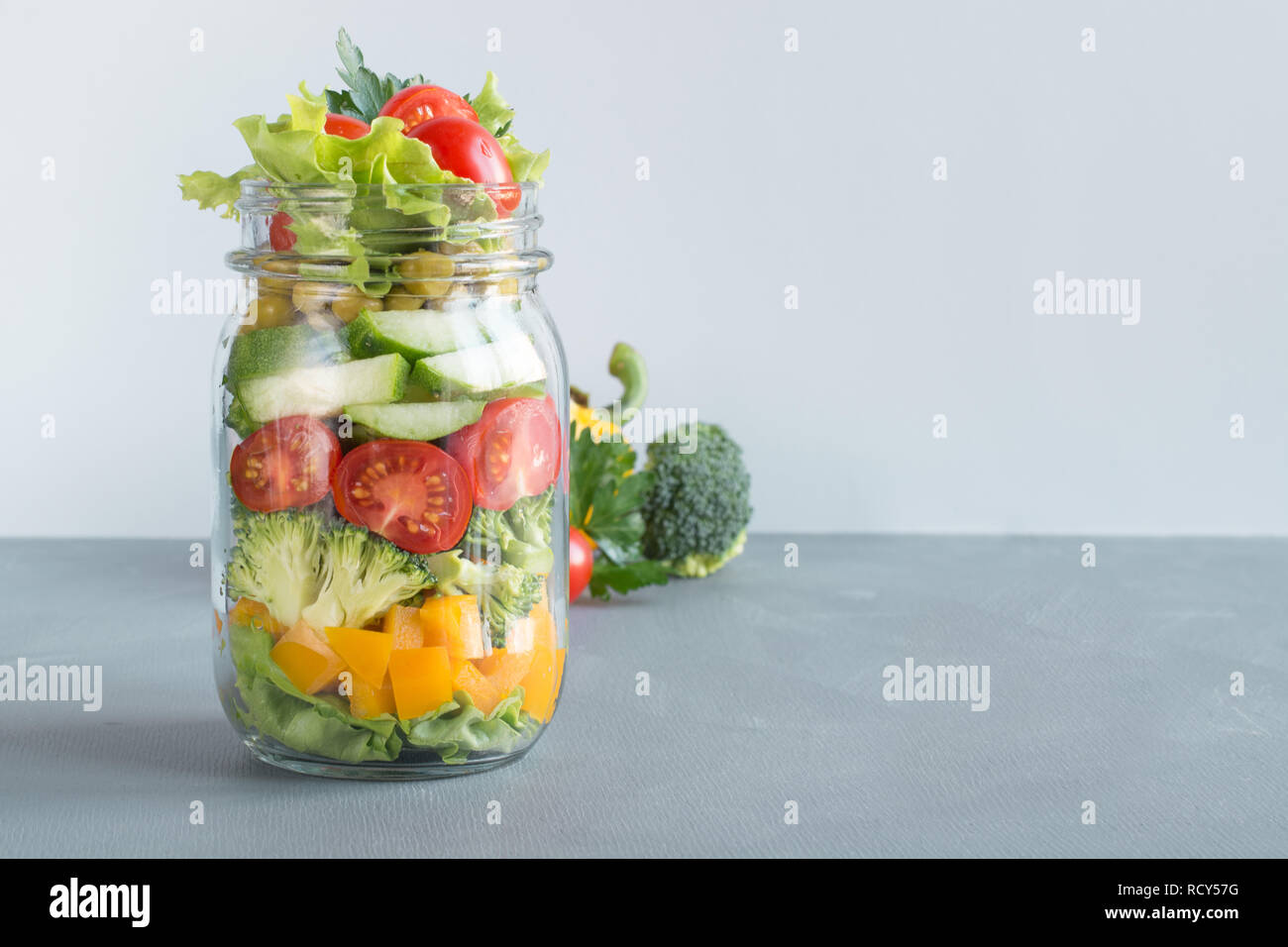 Clean eating. Vegetable healthy homemade detox colorful salad in mason ...