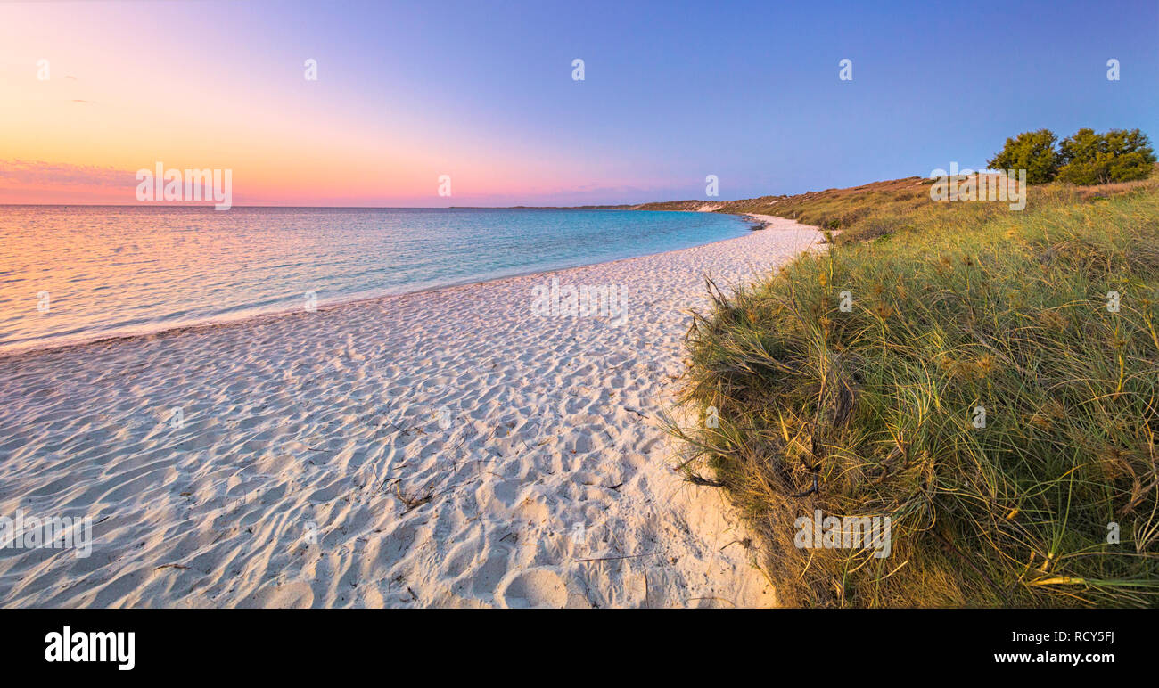 Australian beach at sunset. Coral Bay, Western Australia Stock Photo ...