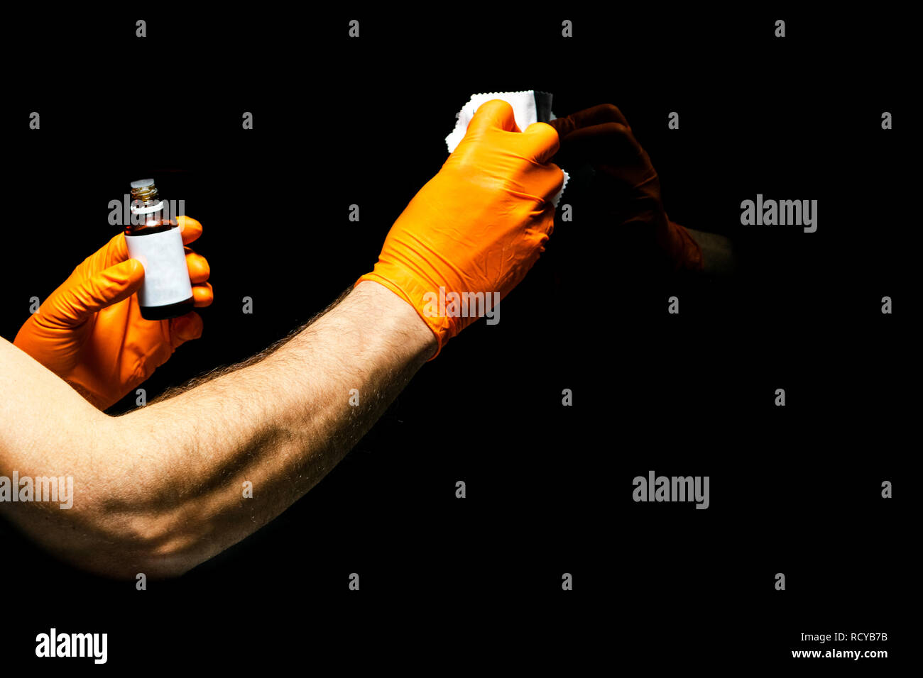 Car polish wax worker hands polishing car. Buffing and polishing ...