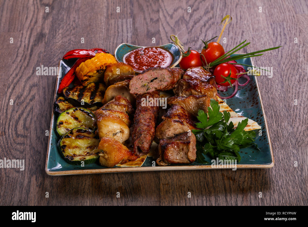 Grilled plate mix assortment meat Stock Photo - Alamy