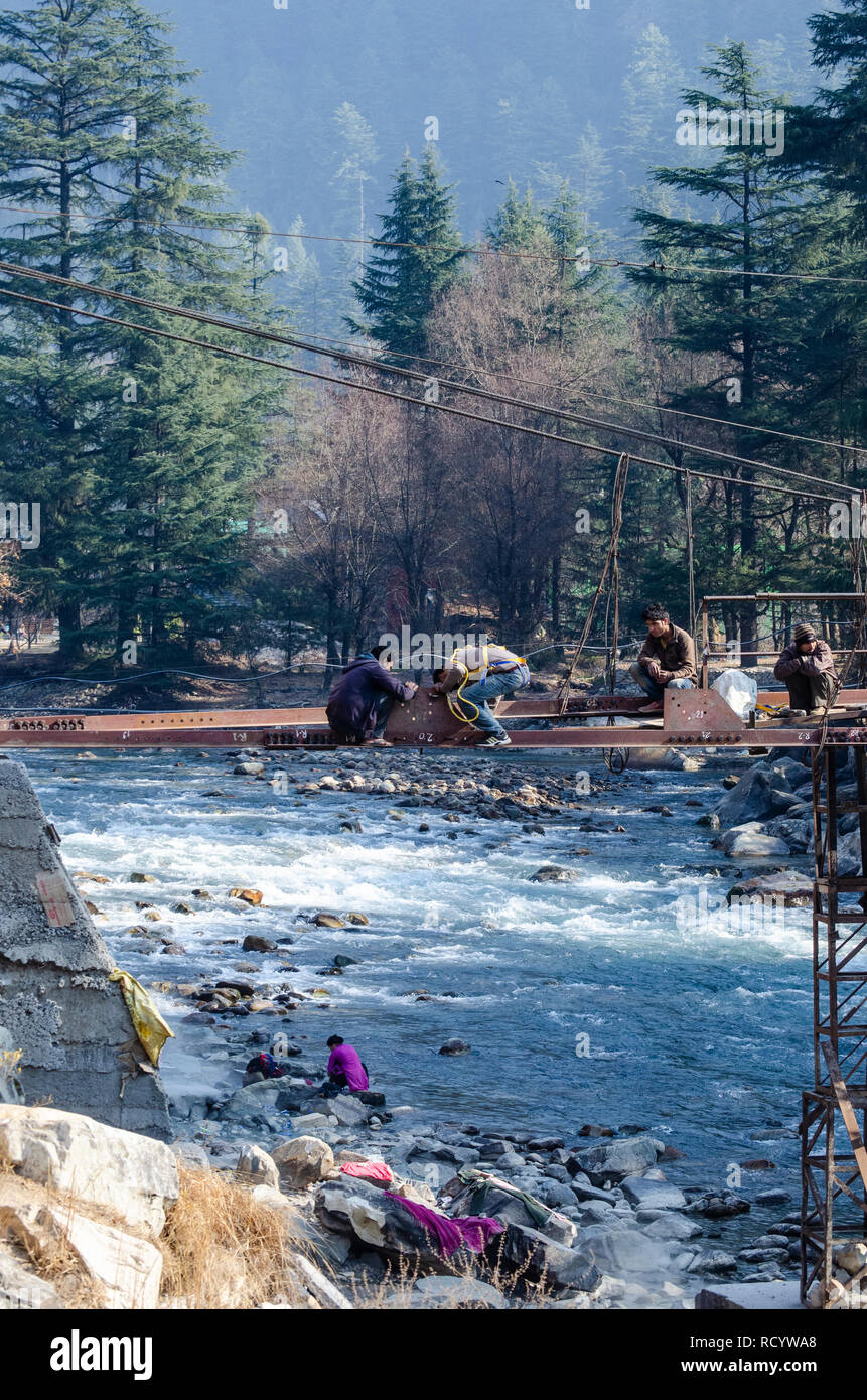 Repairing a footover bridge at Kasol. This joins the Chalal and Rashol ...