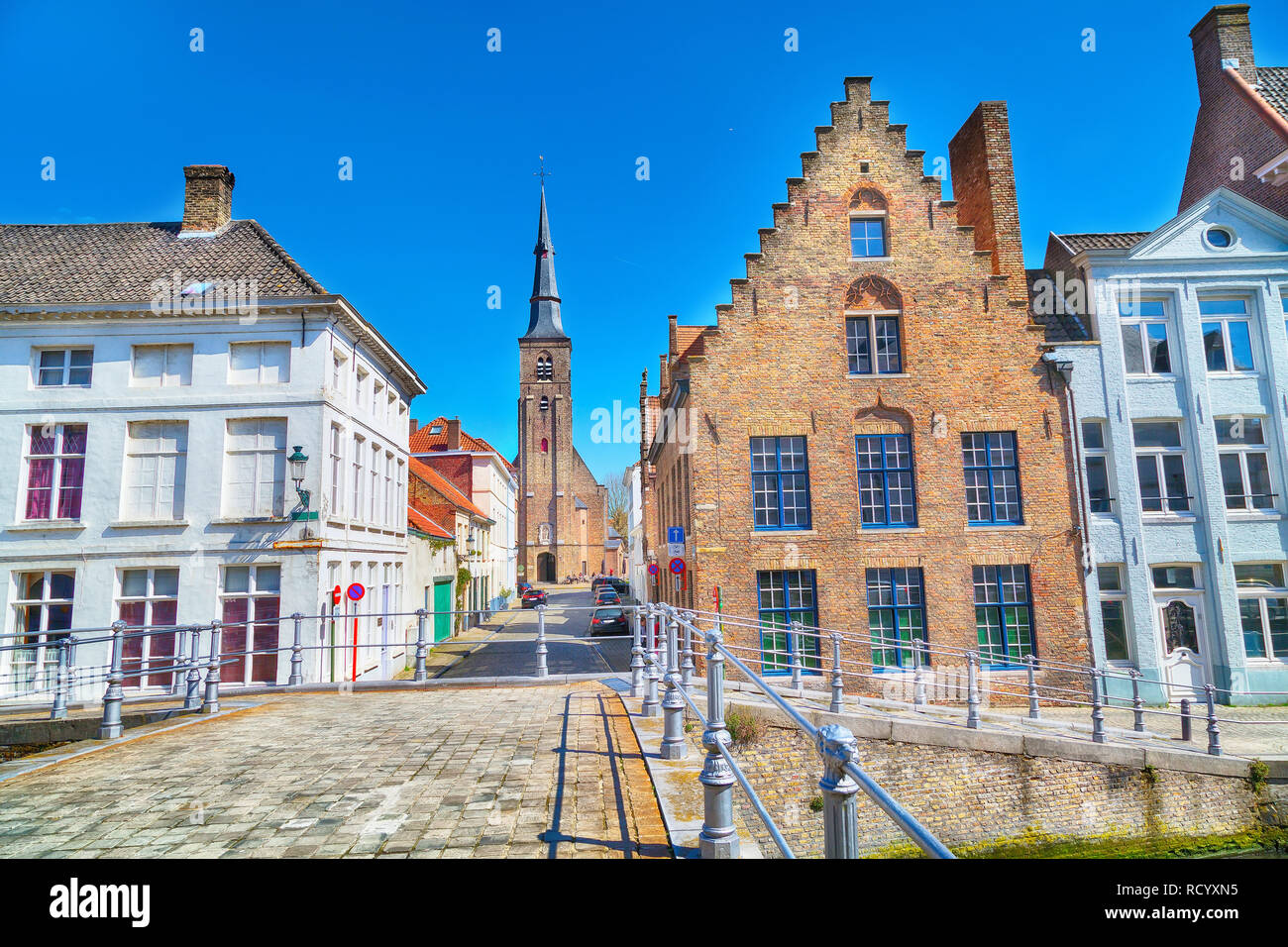 Panorama with cathedral tower and traditional houses in popular belgian ...