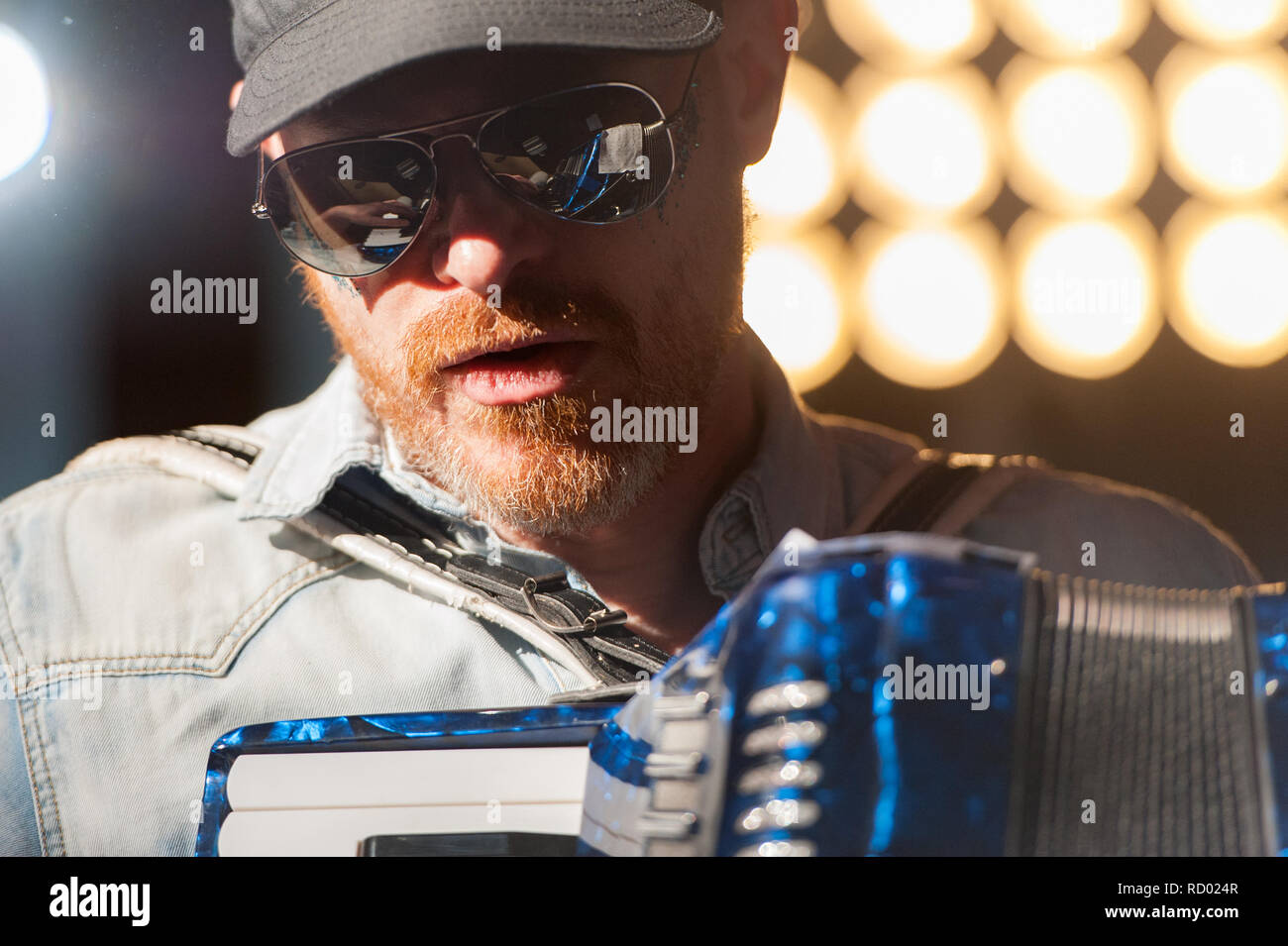 Three daft monkeys on stage with Roy Harter at The Bearded Theory ...