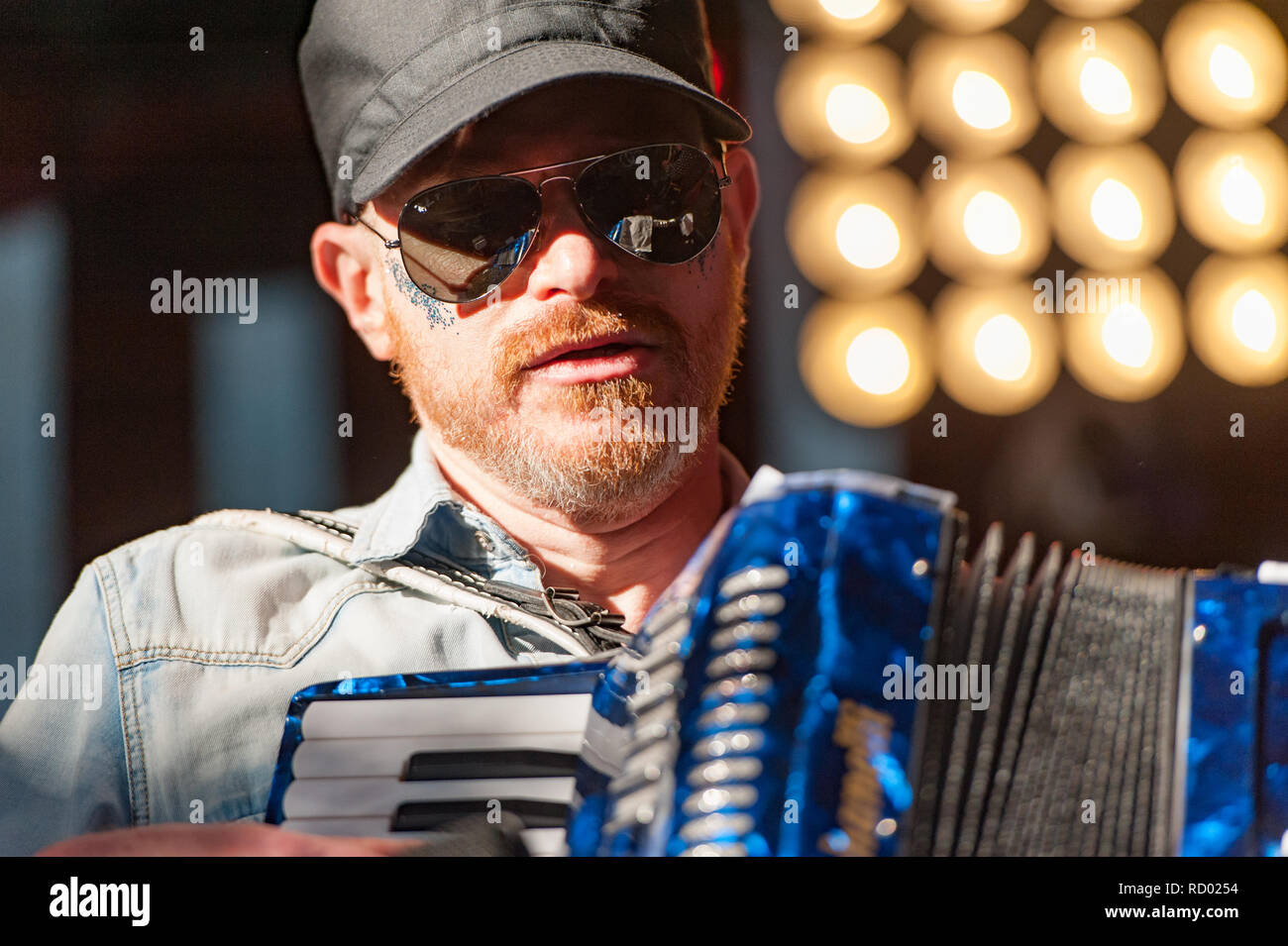 Three daft monkeys on stage with Roy Harter at The Bearded Theory ...