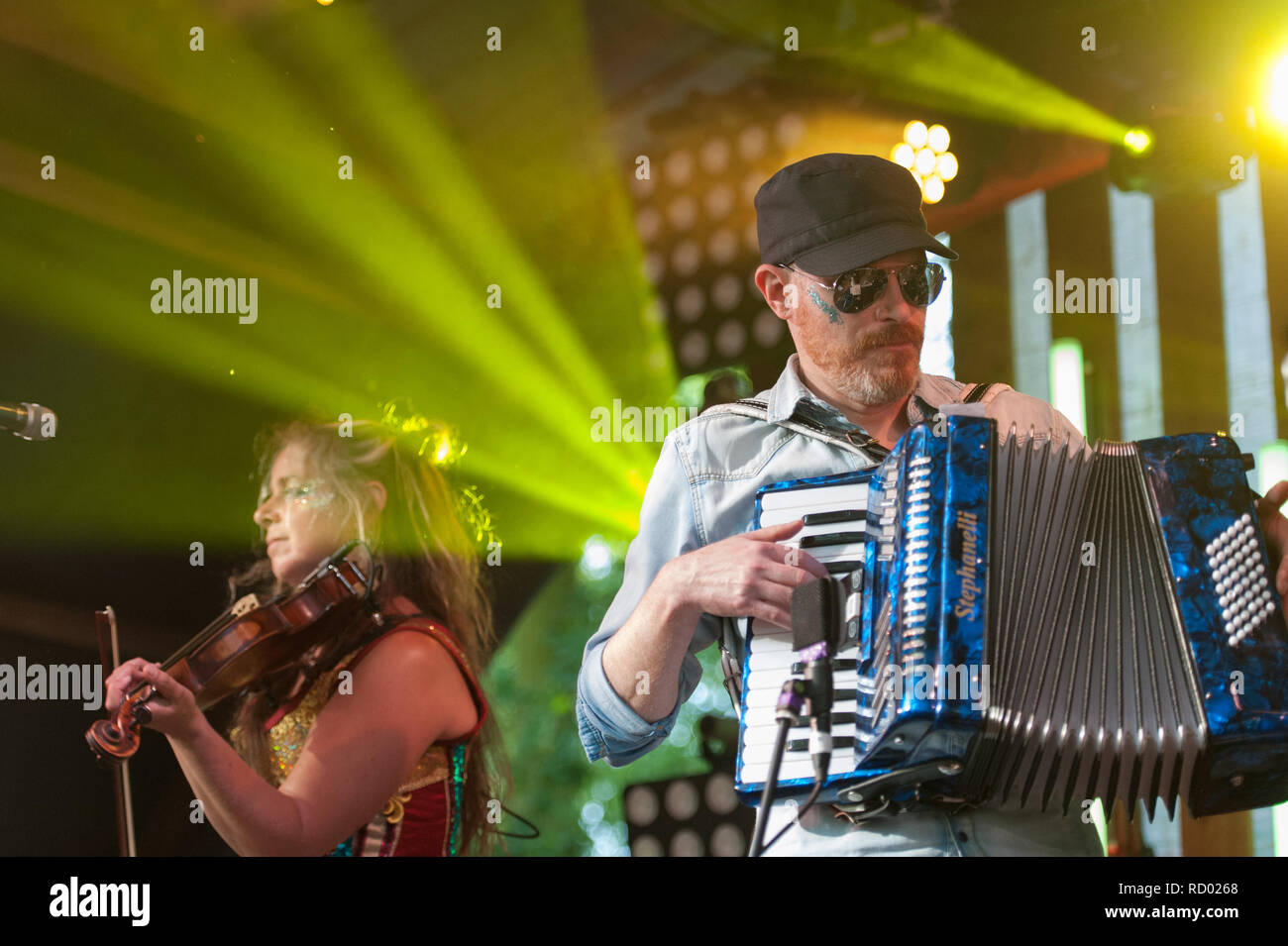 Three daft monkeys on stage with Roy Harter at The Bearded Theory ...