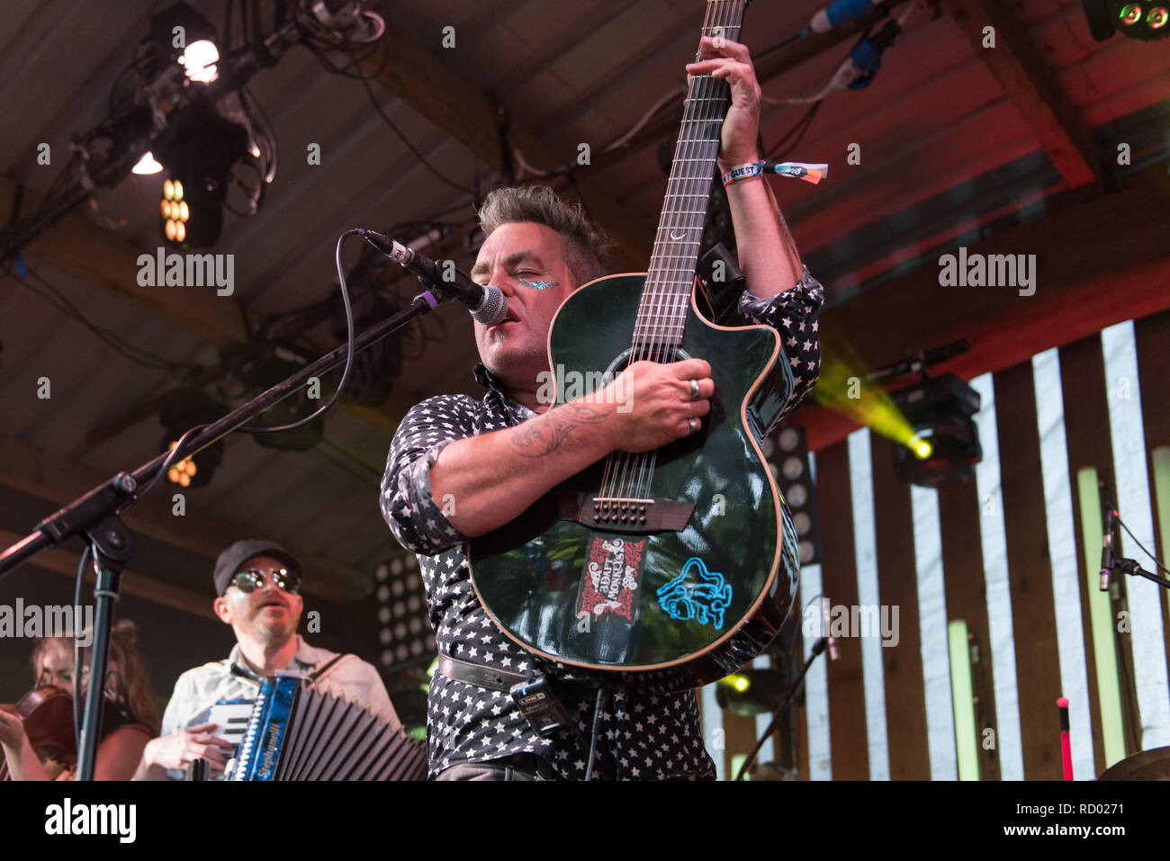 Three daft monkeys on stage with Roy Harter at The Bearded Theory ...