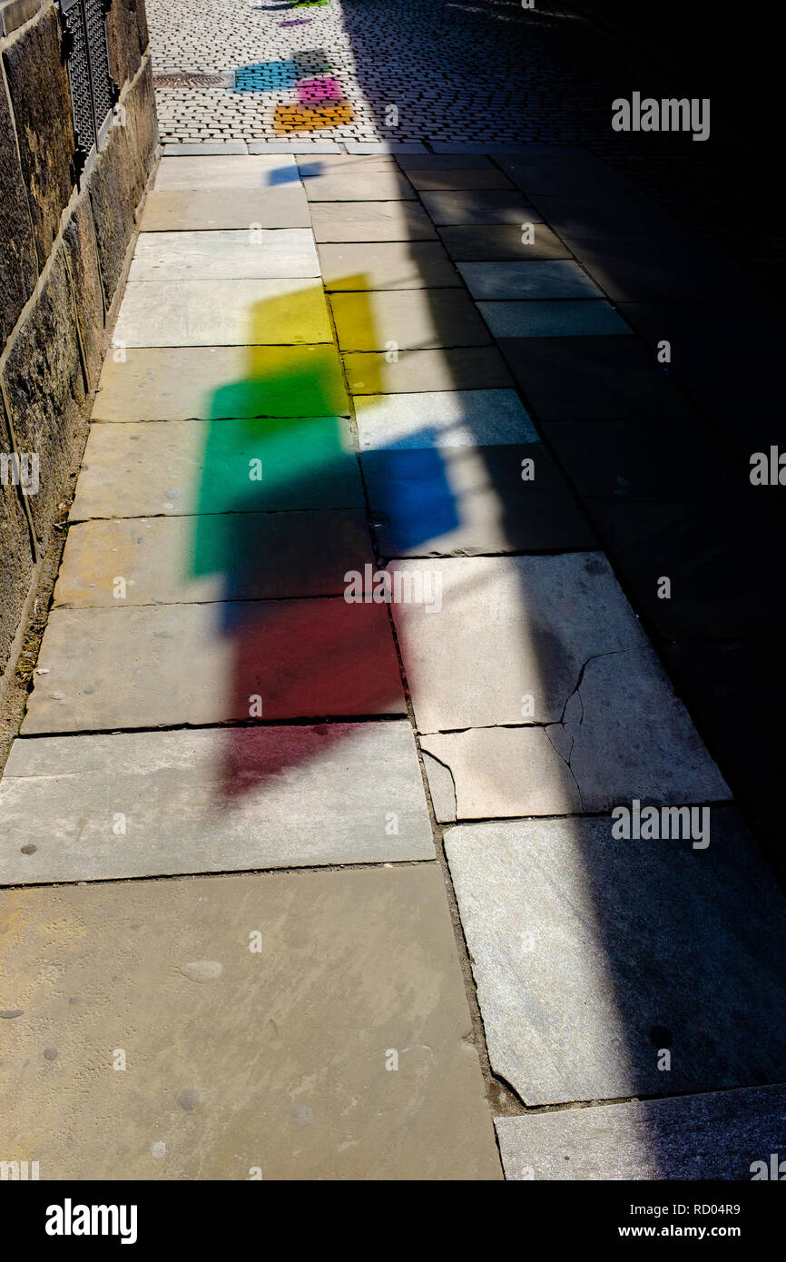 Coloured shapes on a cobbled street surface in Copenhagen Denmark Stock ...