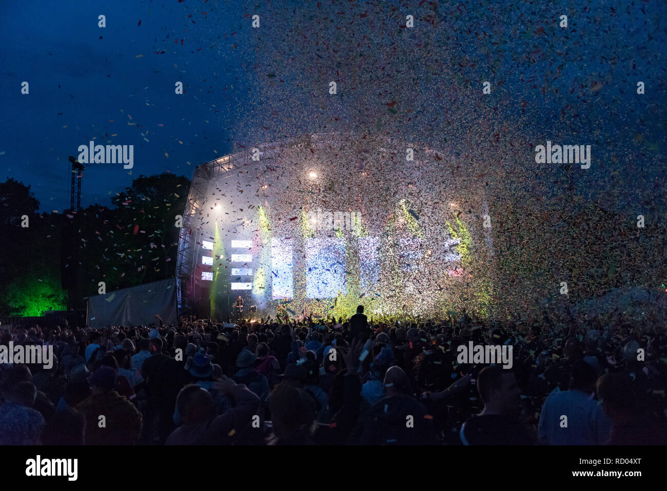 View of the stage and crowd at night with streamers Stock Photo - Alamy