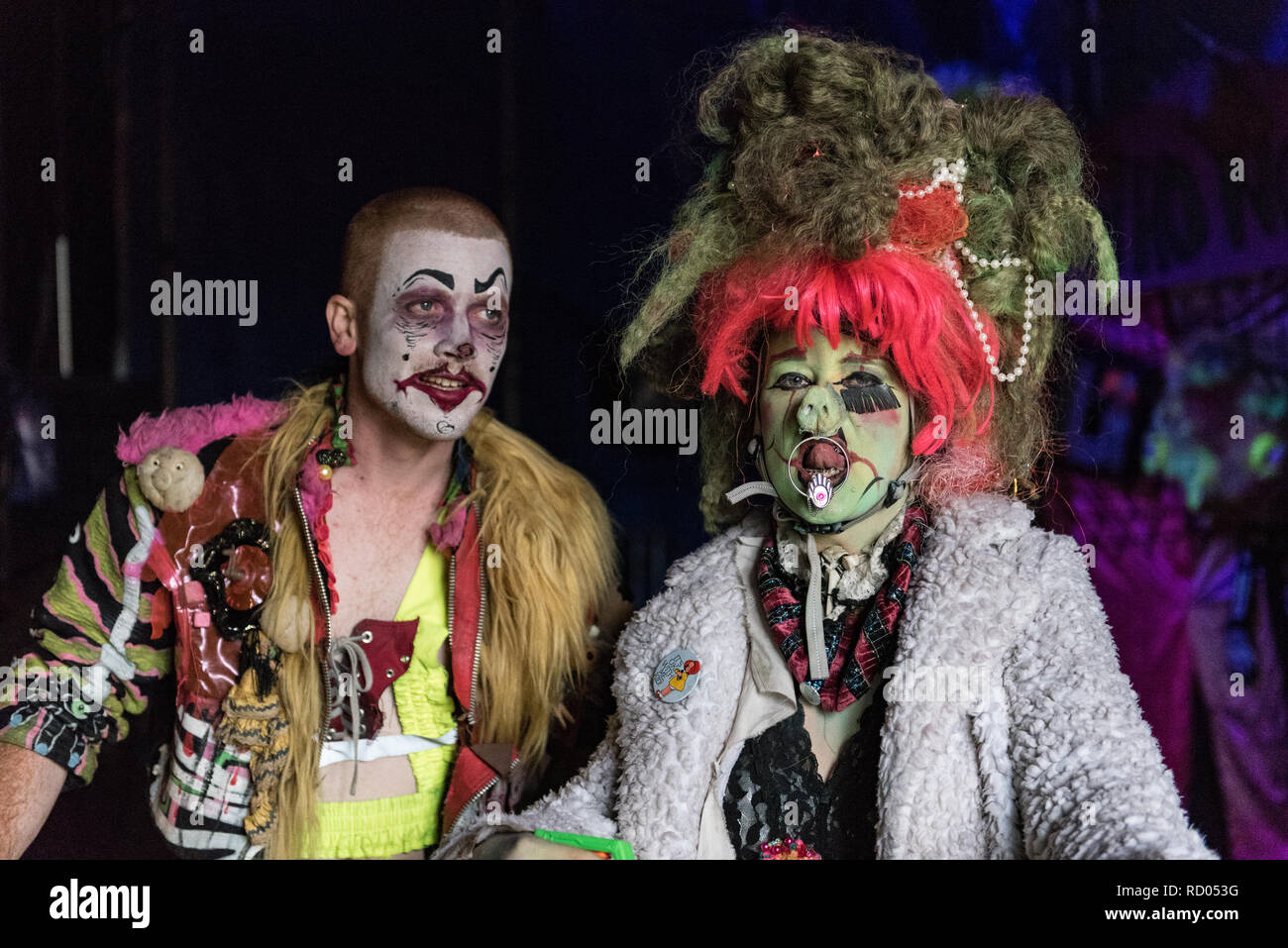 two people in fancy dress at a music festival Stock Photo - Alamy